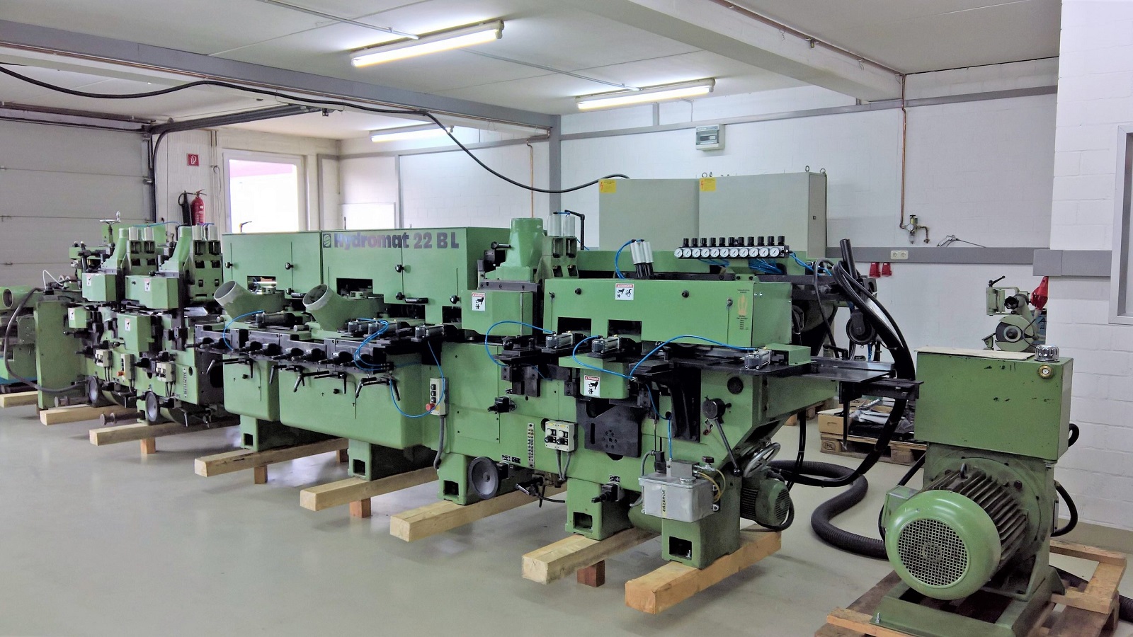 WEINIG planing line with Hydromat H22BL - 120 m / min. - 12 spindles